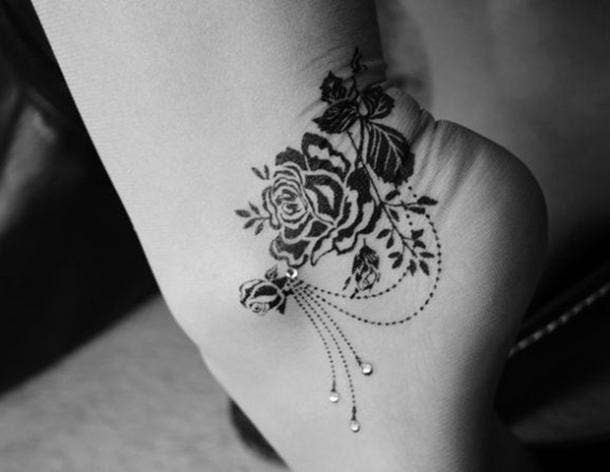29 Tattoo Design Ideas With Dermal Piercings To Add Glam To Your Ink Yourtango